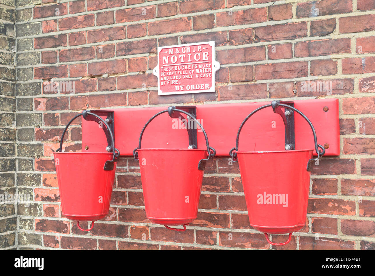 Three red fire buckets on platform at Sheringham Railway Station, part ...