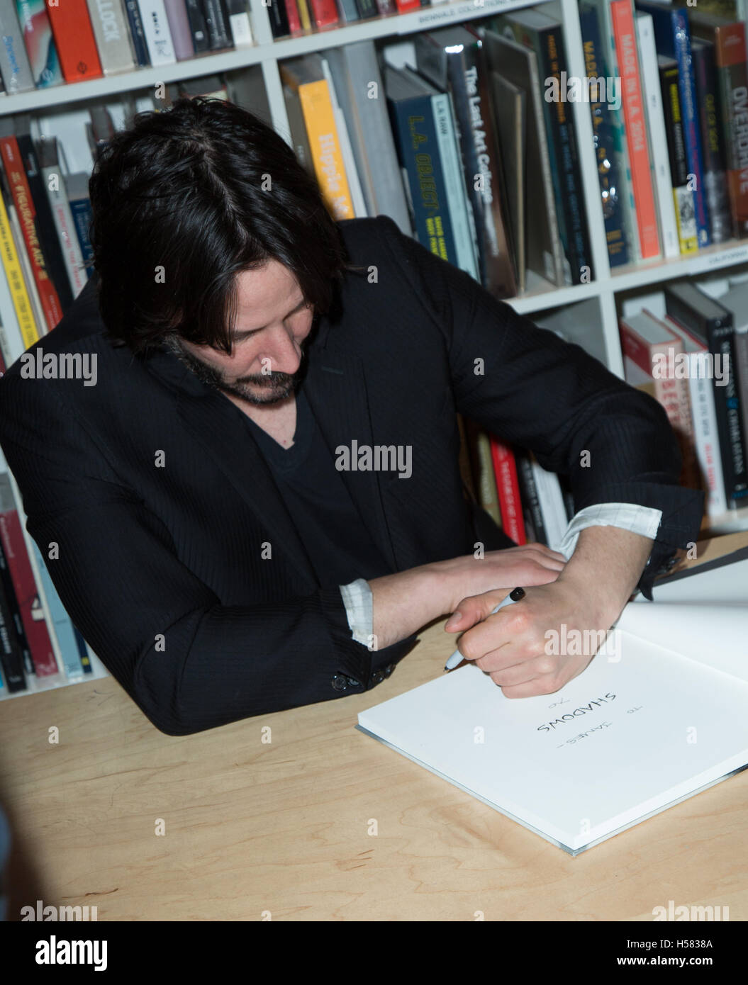 Keanu Reeves attends Alexandra Grant and Keanu Reeves book “Shadows ...