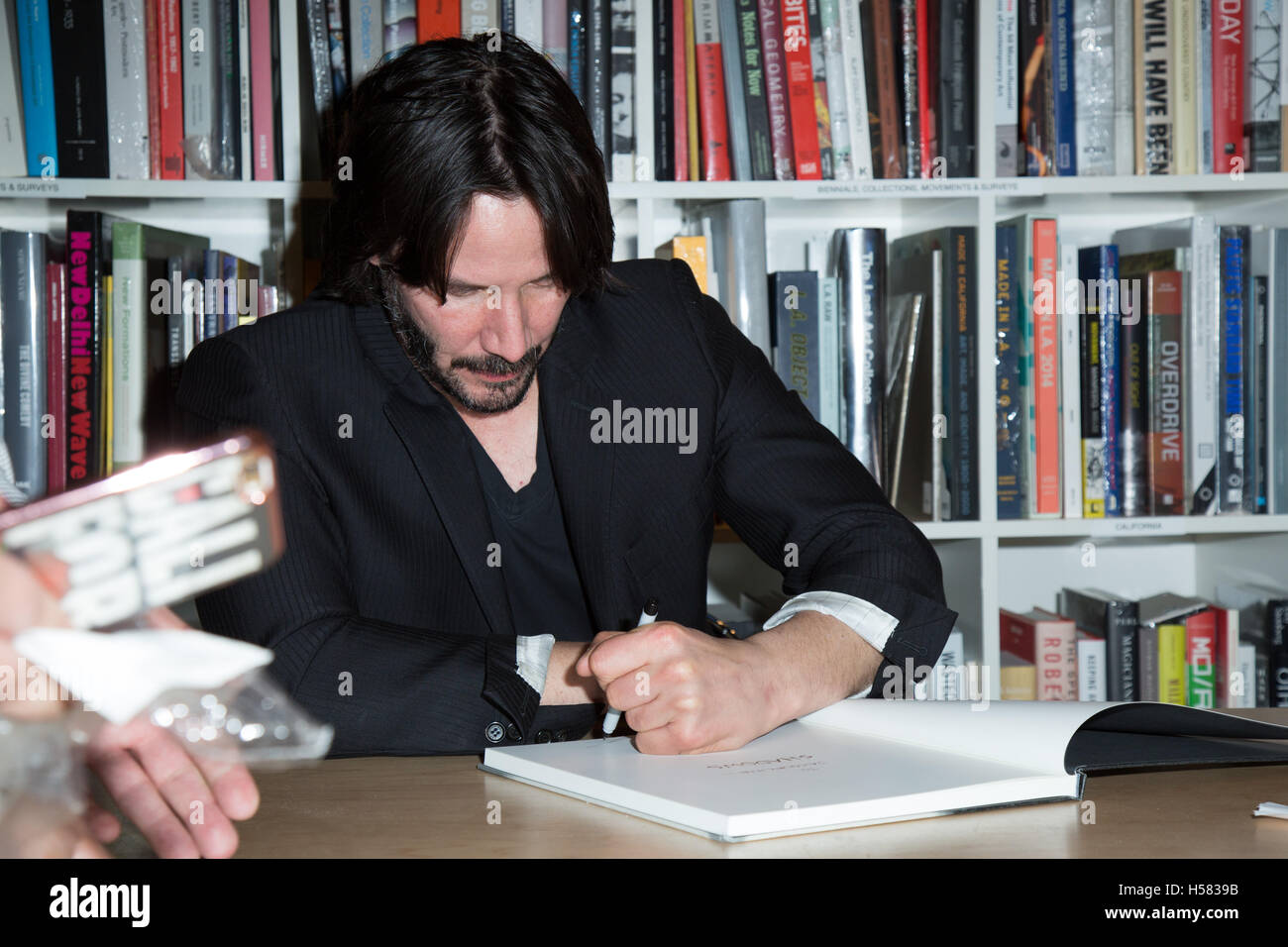 Keanu Reeves attends Alexandra Grant and Keanu Reeves book “Shadows ...