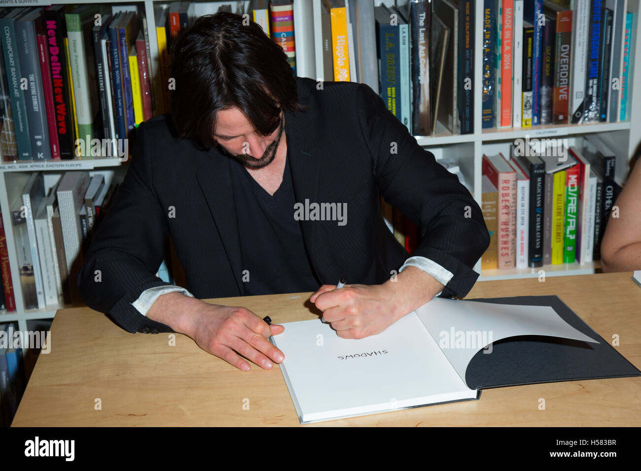 Keanu Reeves attends Alexandra Grant and Keanu Reeves book “Shadows ...