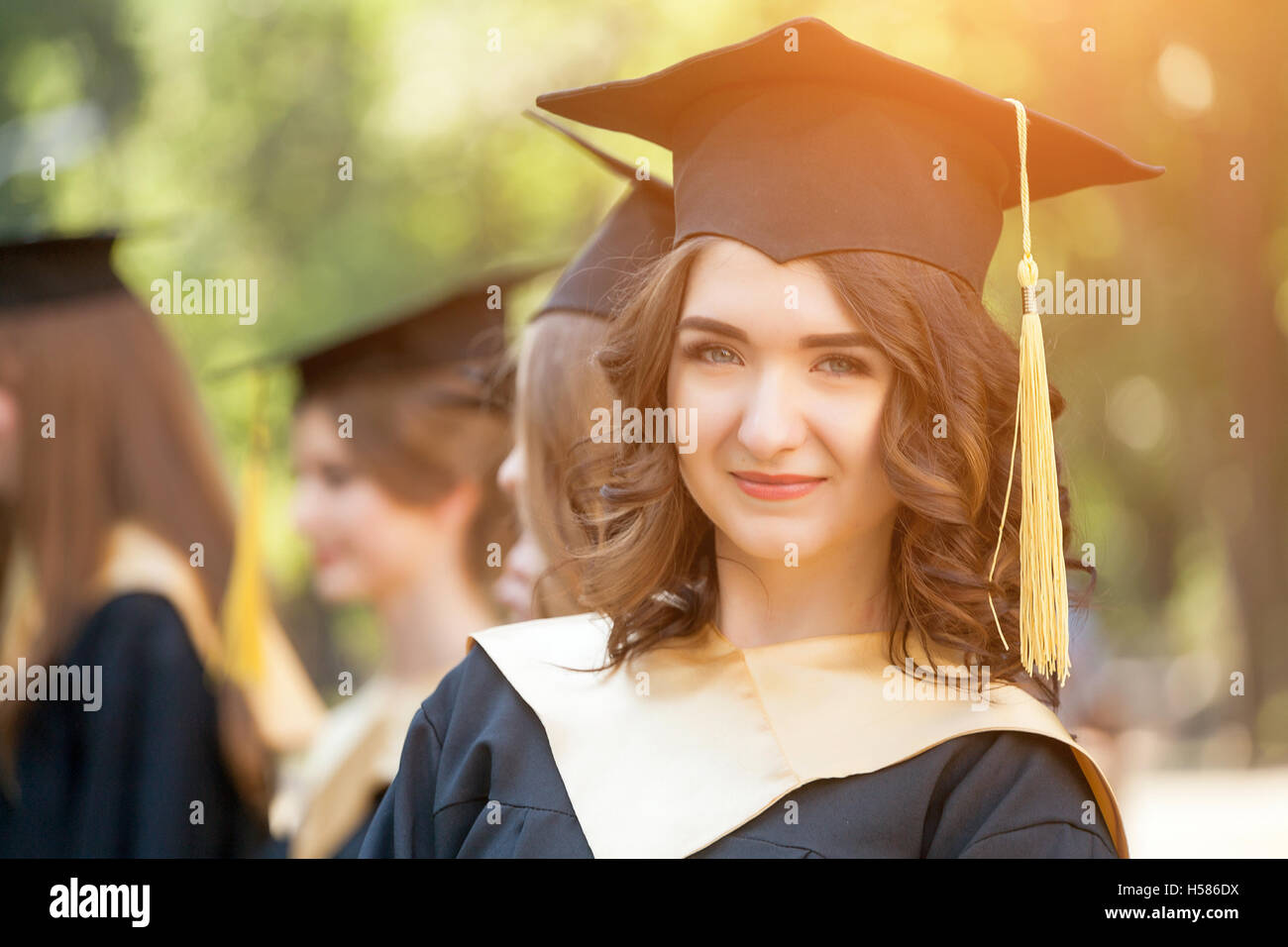 Portrait of graduated student on university campus Stock Photo - Alamy