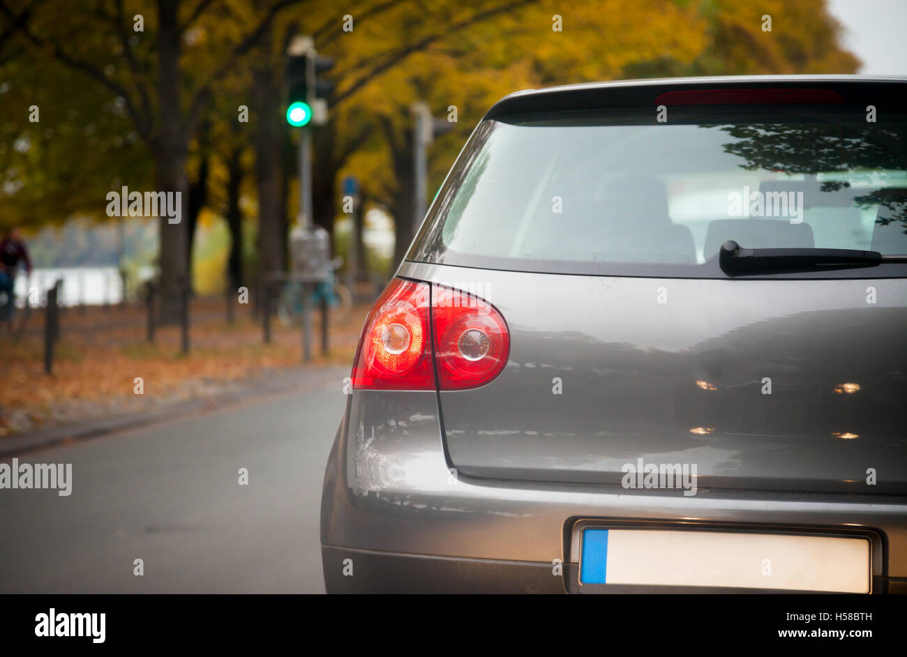 car stands on a green traffic light Stock Photo - Alamy