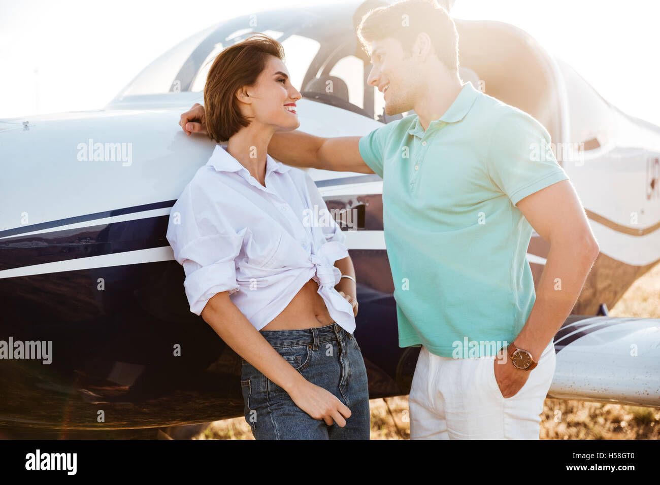 Airplane Couple Young Flight Trip High Resolution Stock Photography and ...