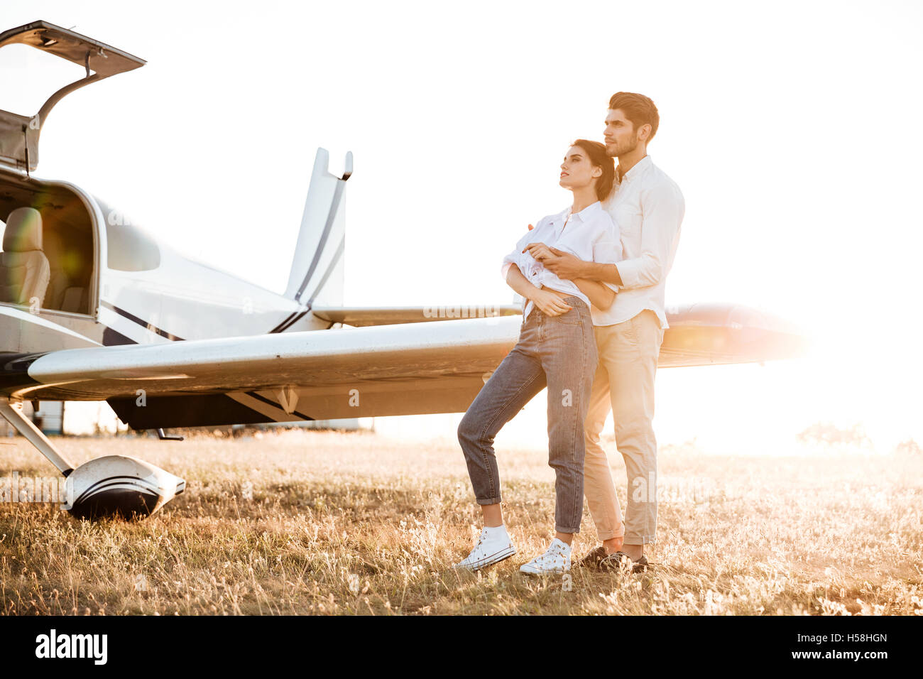 Couple airplane honeymoon hi-res stock photography and images - Alamy