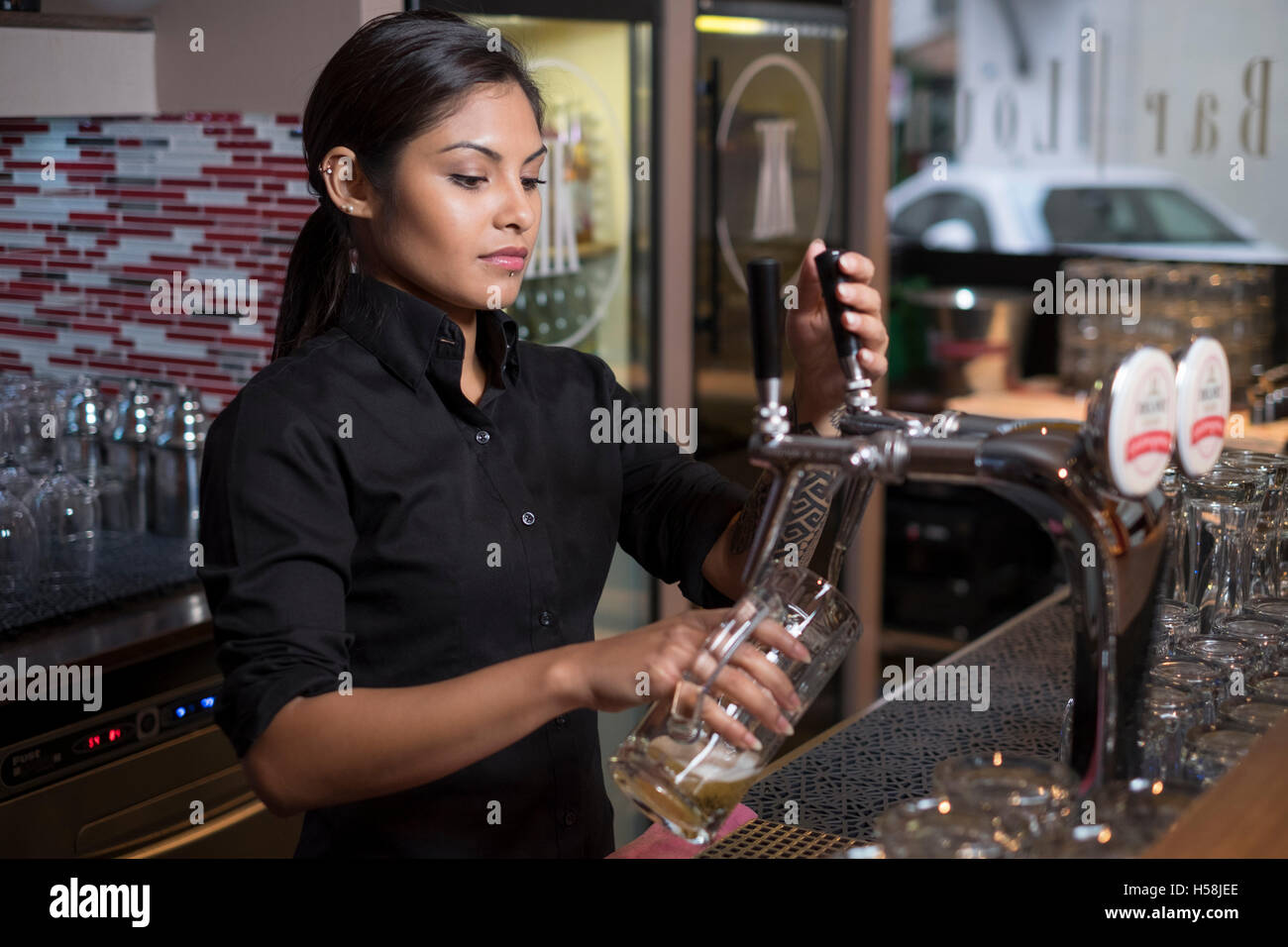 Female bartender hi-res stock photography and images - Alamy