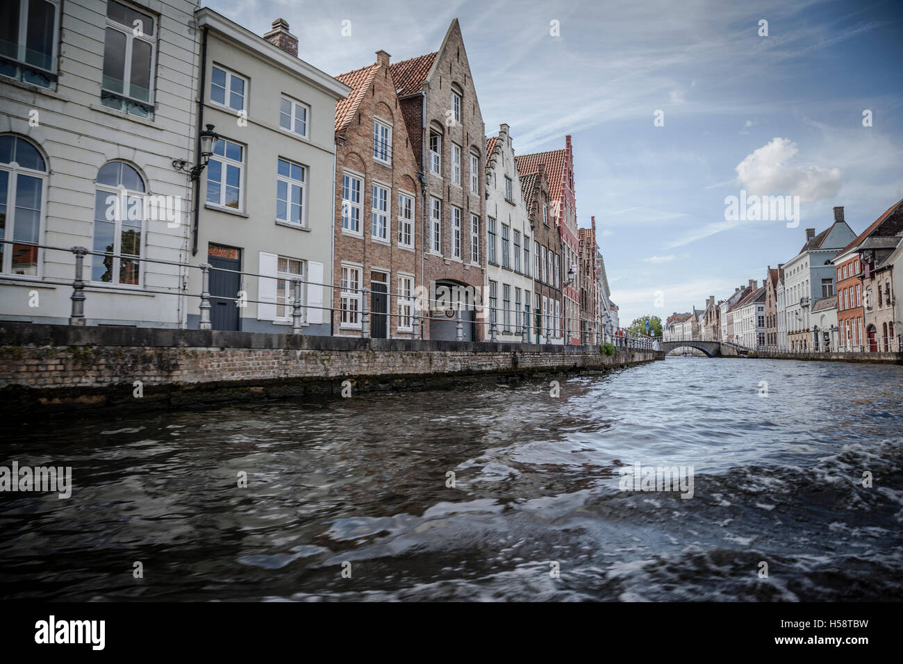 Scenic city view of Bruges canal with beautiful medieval colored houses ...