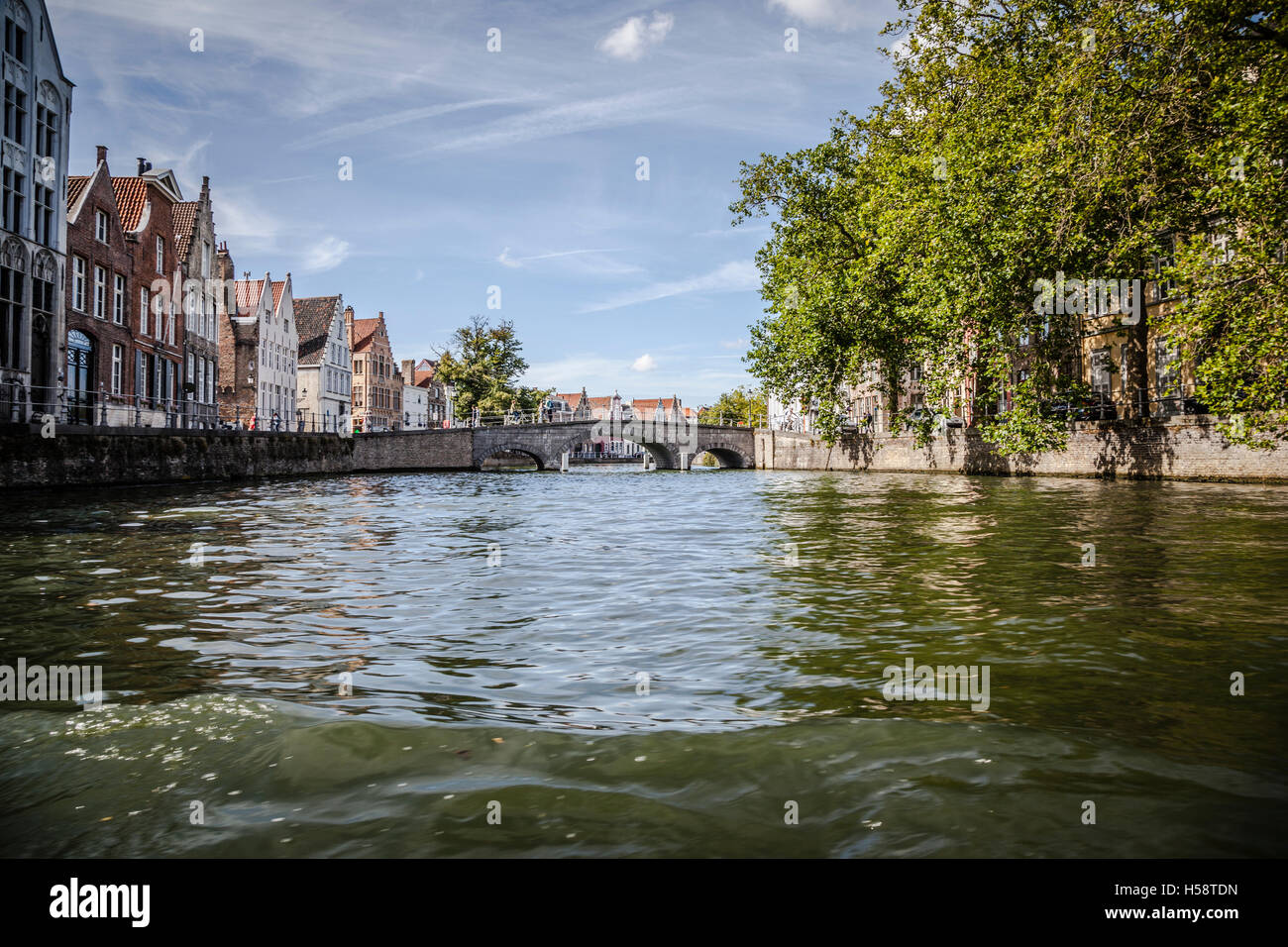 Scenic city view of Bruges canal with beautiful medieval colored houses ...