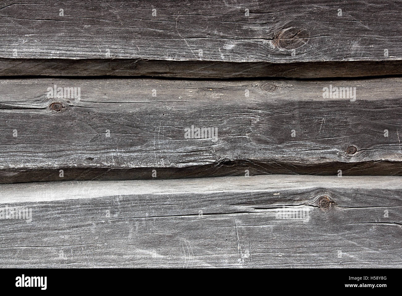 Old texture of wooden logs in brown tones. Old wooden exterior wall of ...