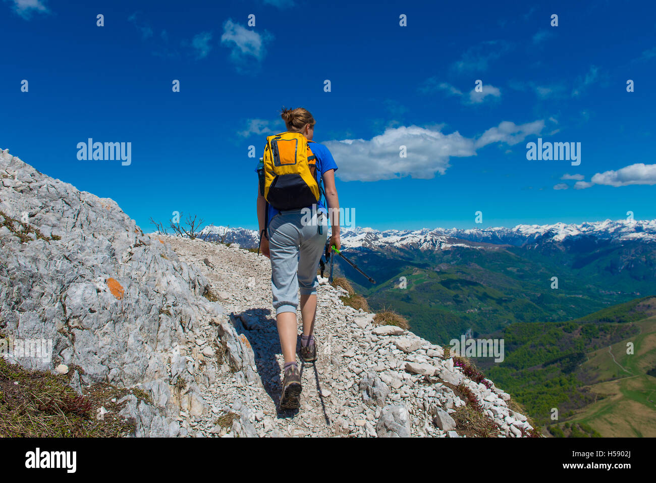 Trekking in the Alps Italian / a girl Stock Photo - Alamy