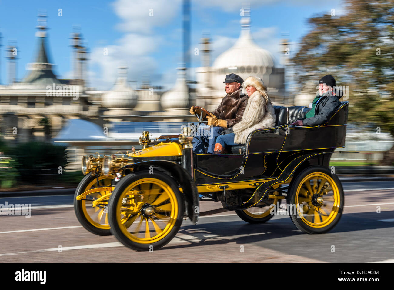 The Veteran Car Rally: Cars arriving in the city and driving past the ...