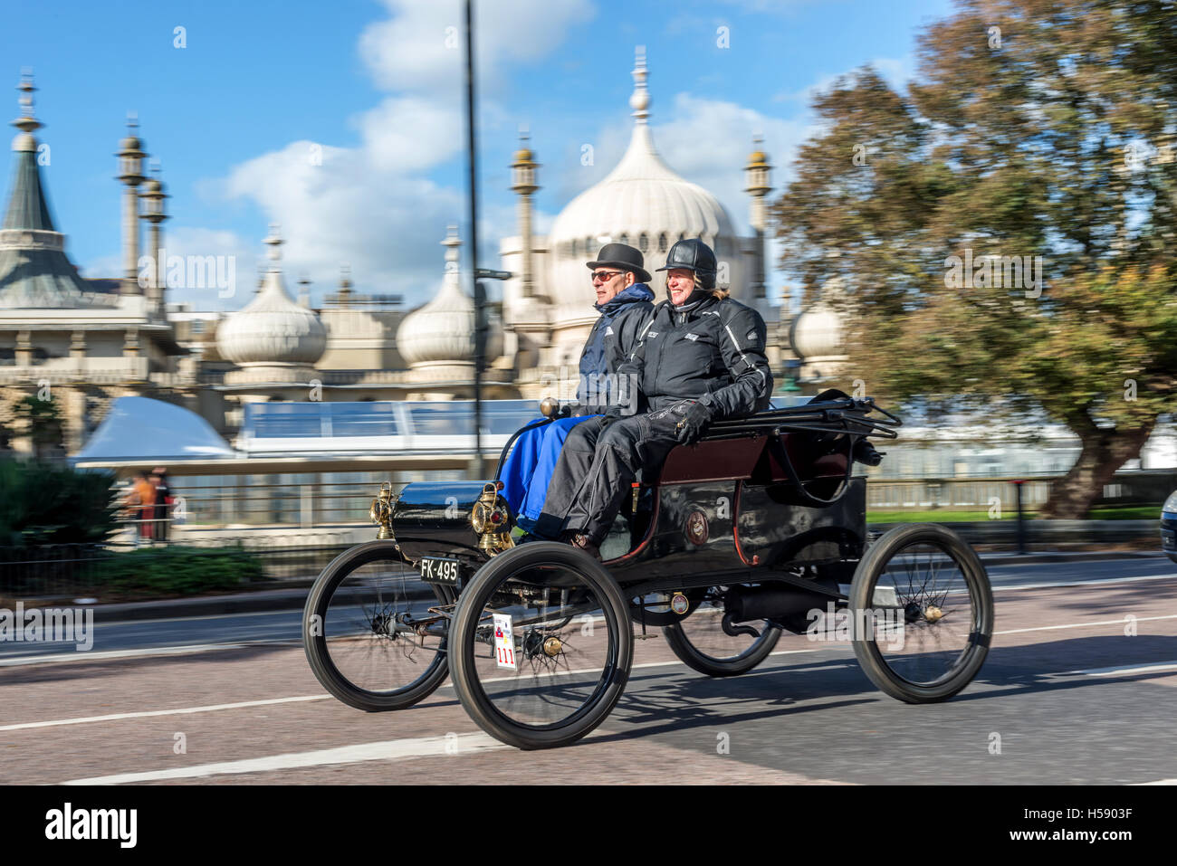 The Veteran Car Rally: Cars arriving in the city and driving past the ...