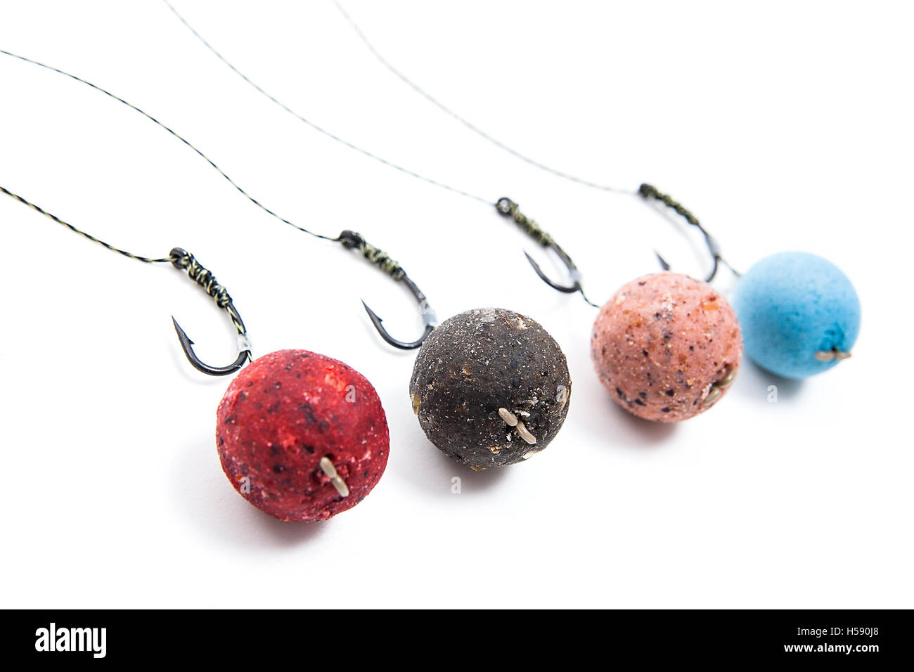 Close up view of fishing baits. View of fishing hook with different ...