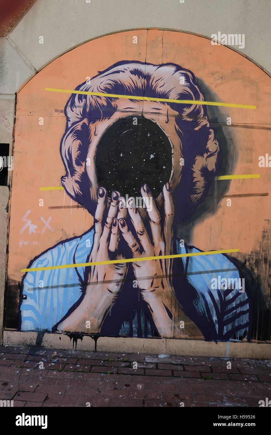 Graffiti depicting a woman holding a mirror Stock Photo - Alamy