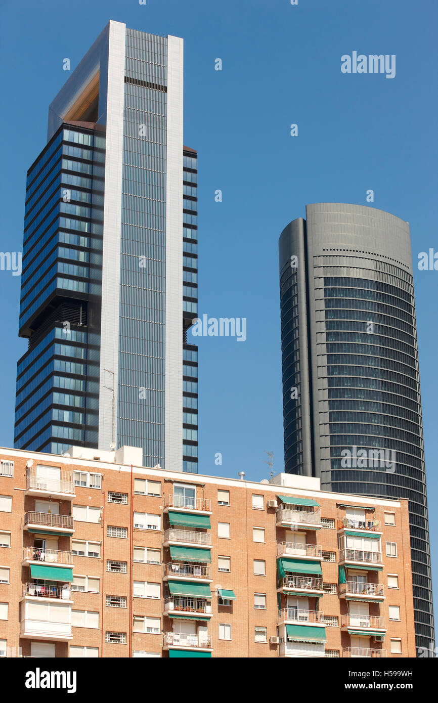 Residential block and modern finance skyscrapers in Madrid. Spain ...