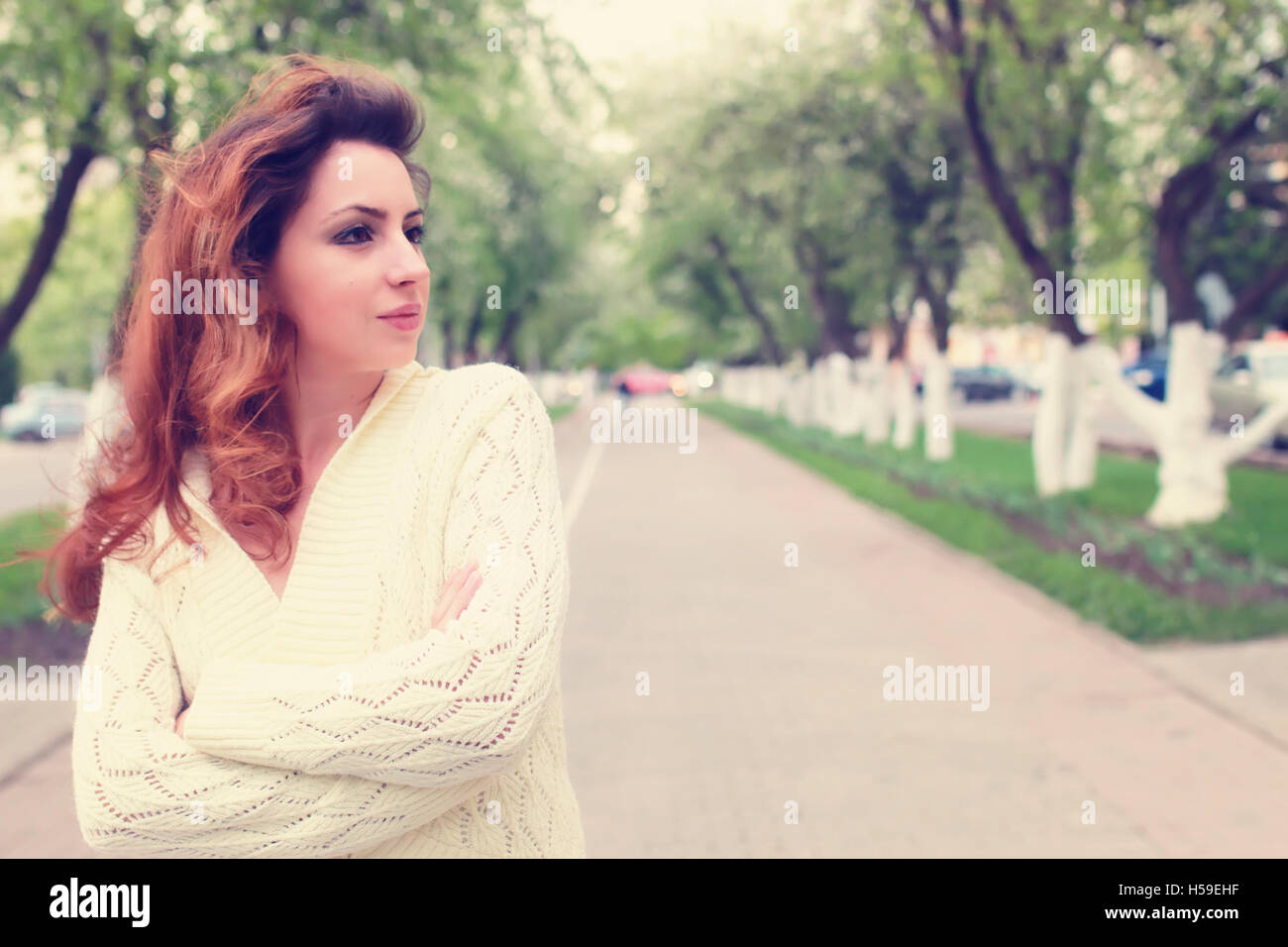 girl walking in spring apple alley Stock Photo - Alamy