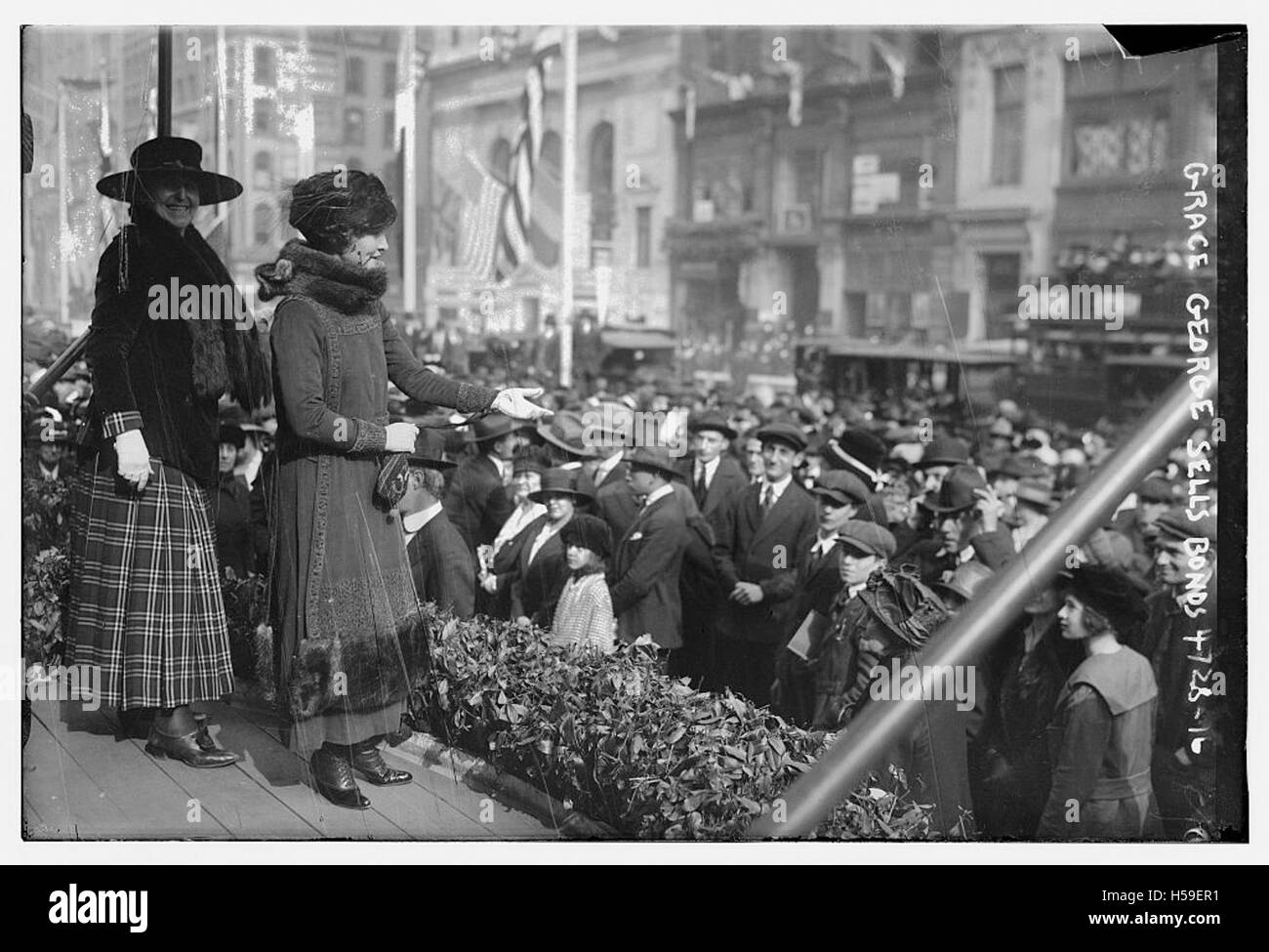 Grace George, a notable figure, is shown selling goods, likely as part ...