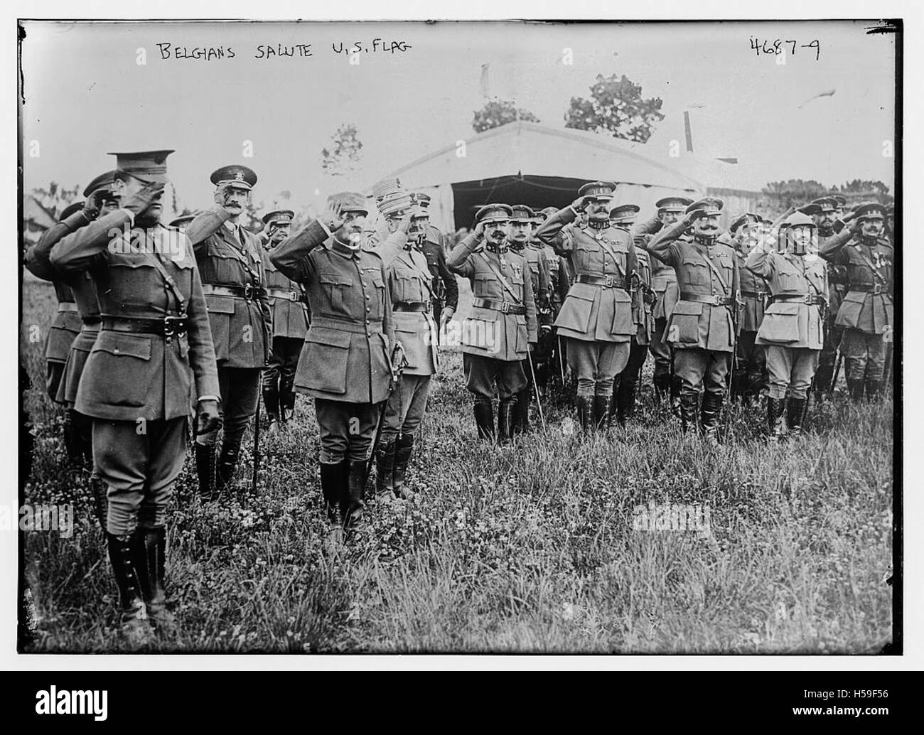 A photograph or scene depicting Belgians saluting the U.S. military ...