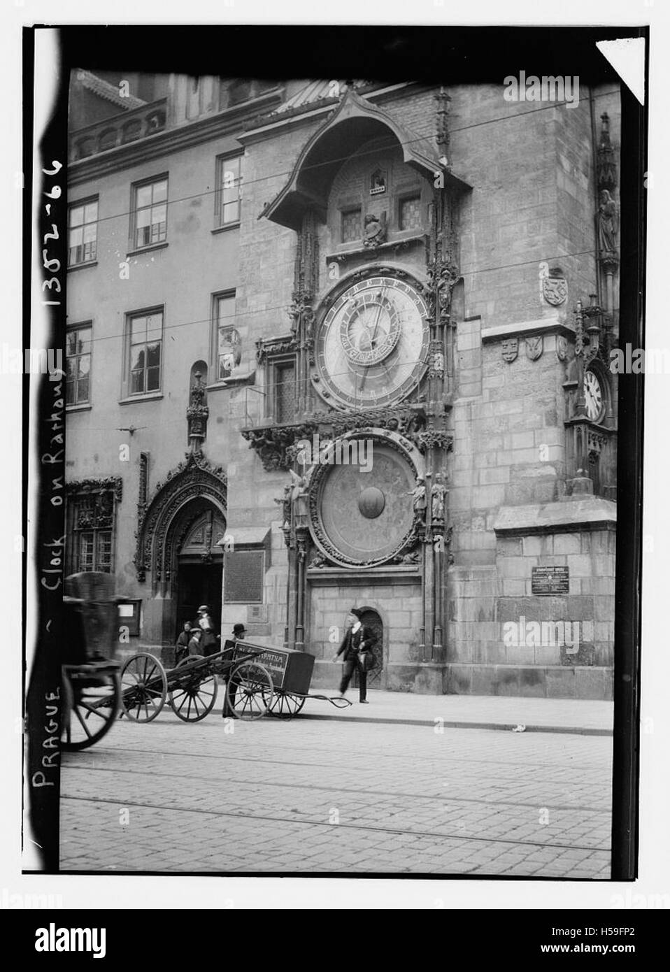 The facade of the City Hall, featuring a prominent clock, is captured ...