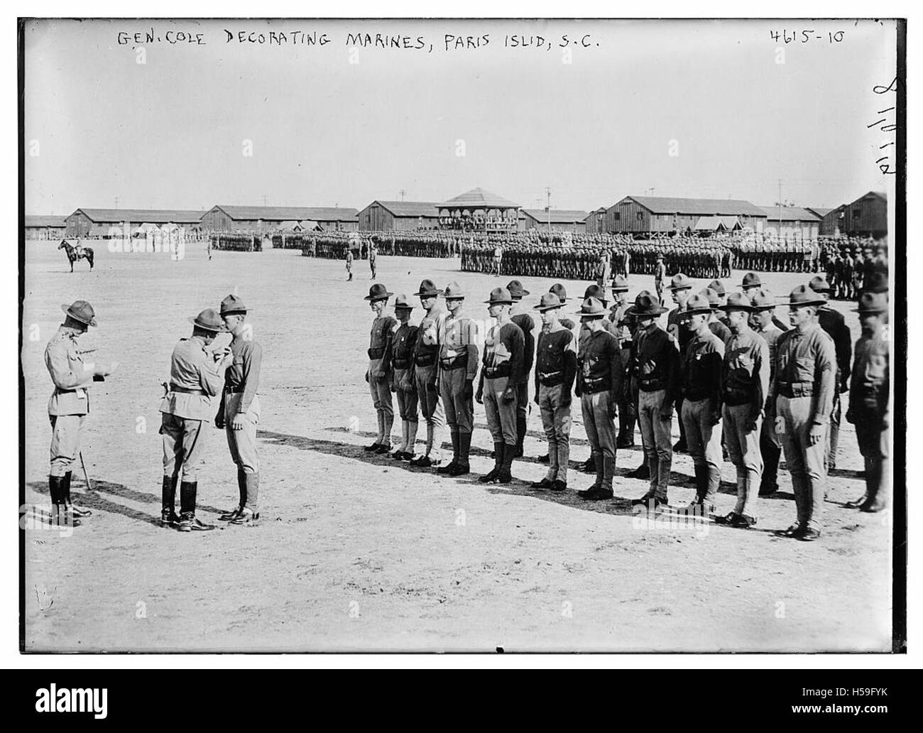 General Cole is seen decorating marines on Paris Island, likely for ...