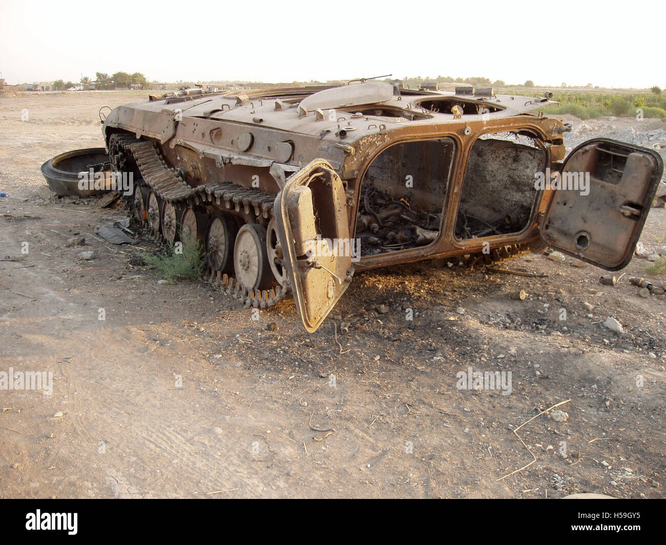 9th July 2003 A burned-out BMP-1 IFV lies abandoned by the roadside ...