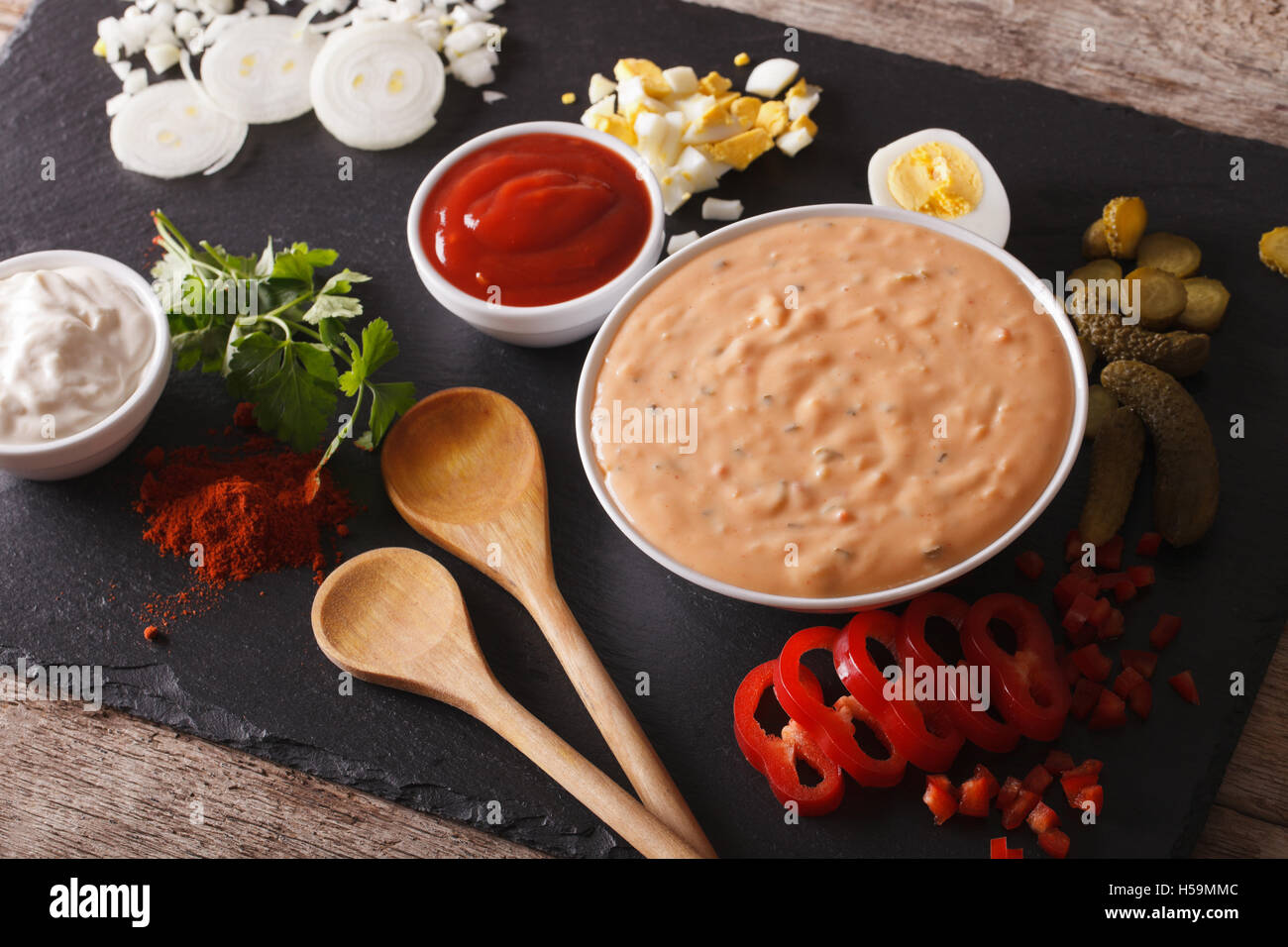 American Dressing thousand islands with ingredients on a slate board on ...