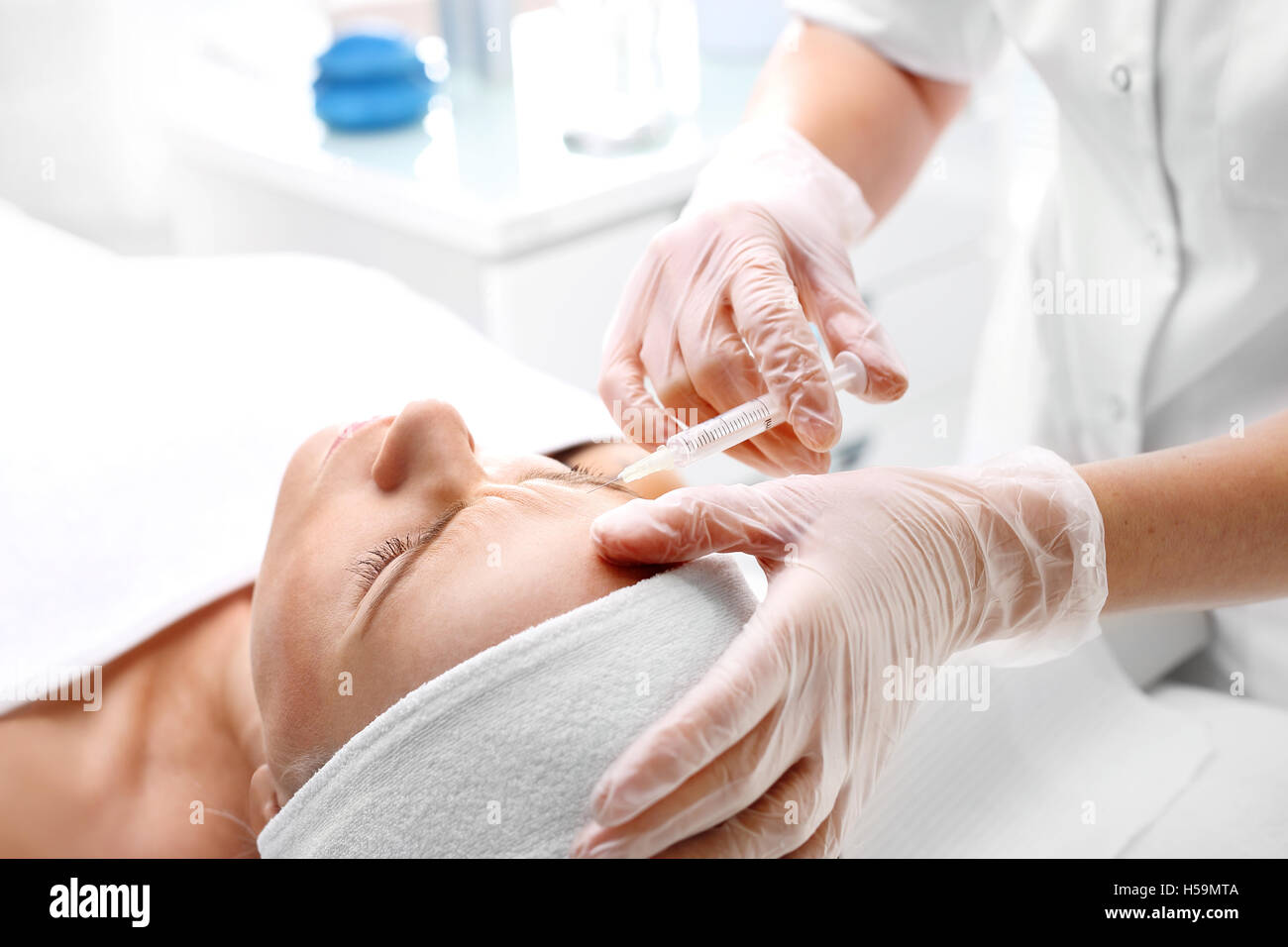 Injection of botox. Filling wrinkles, face lift Stock Photo - Alamy