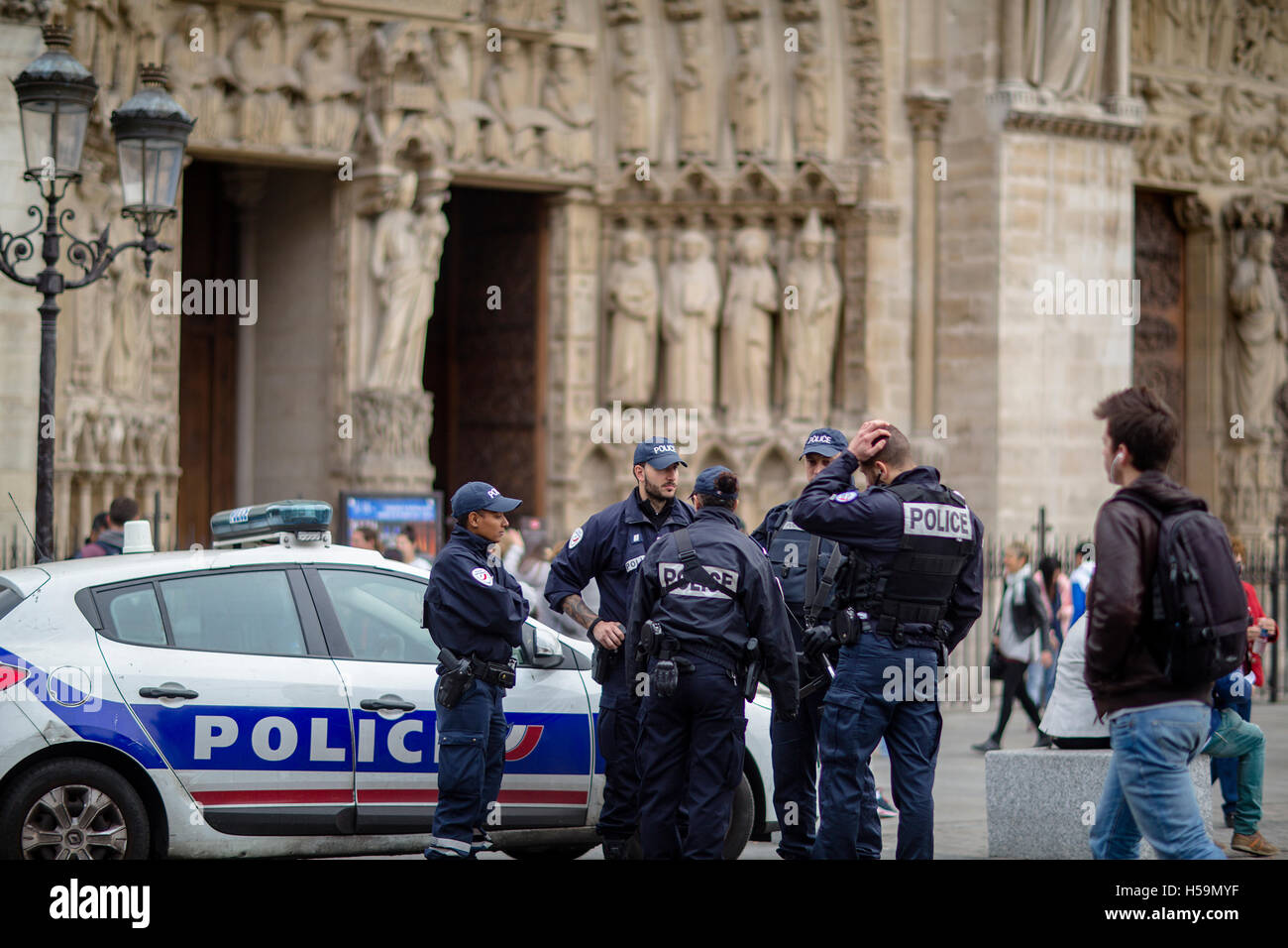 French police patrol the area around the popular tourist attraction ...