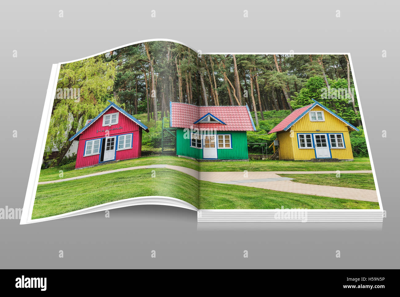 Three colorful wooden houses in the center of, Nidden, Nida, Neringa ...