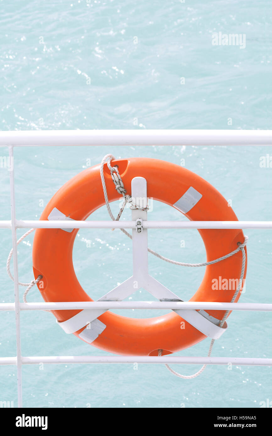 Life guard on a ship, water in background Stock Photo - Alamy