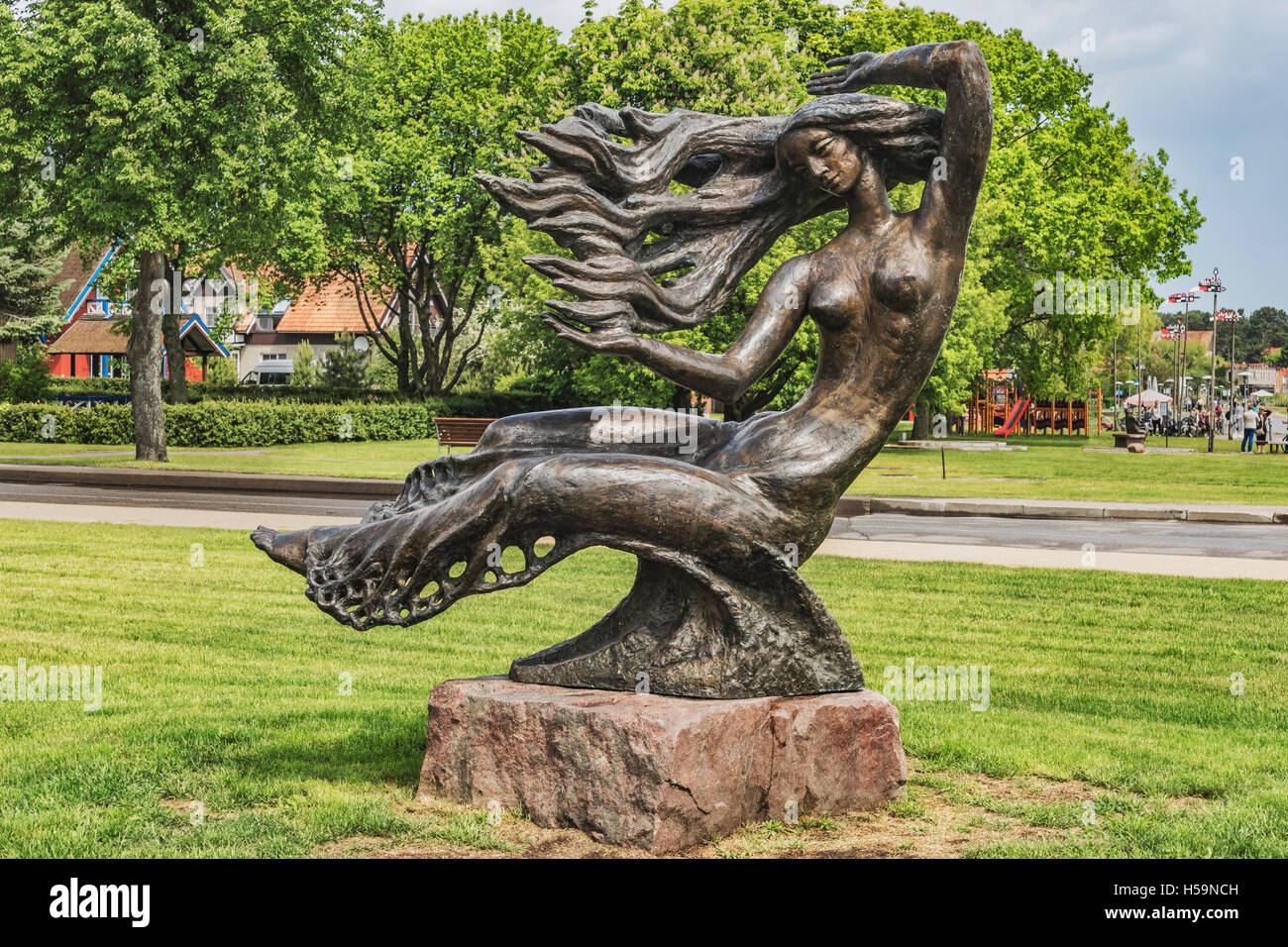 The Bronze Sculpture of Neringa is located in the center of Nida ...