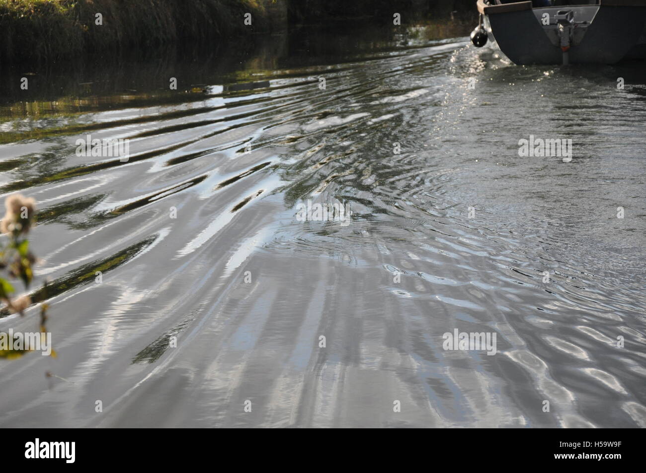 Wake of boat Stock Photo - Alamy