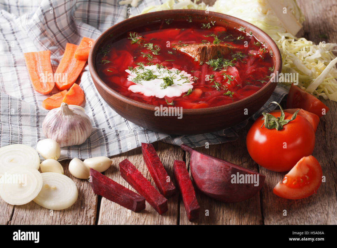 Ukrainian borsch soup and ingredients on the table close-up. horizontal ...