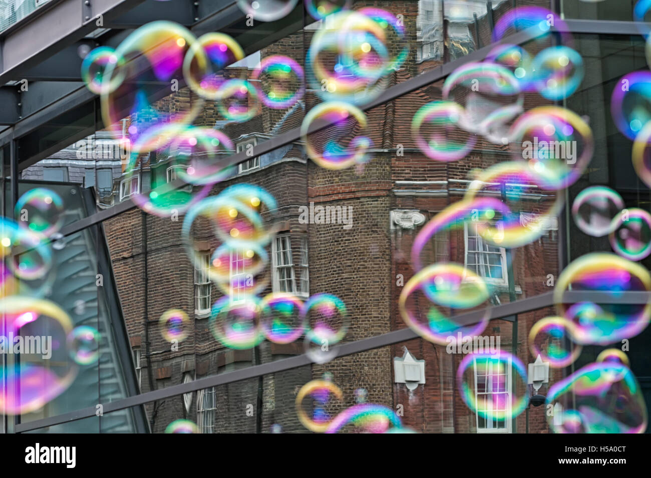 Bubbles from street entertainer on hi-res stock photography and images ...