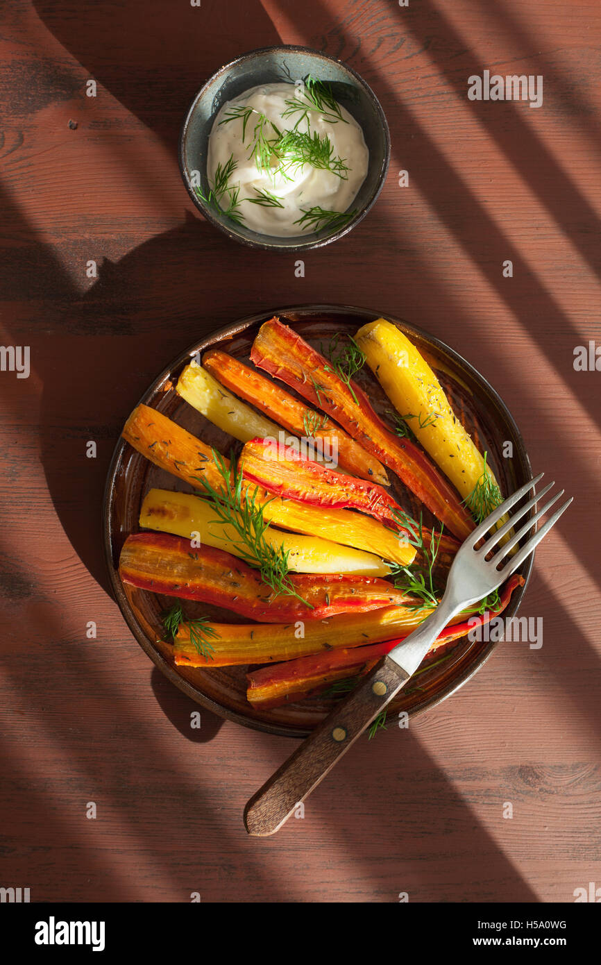 roasted colorful carrots on plate Stock Photo - Alamy
