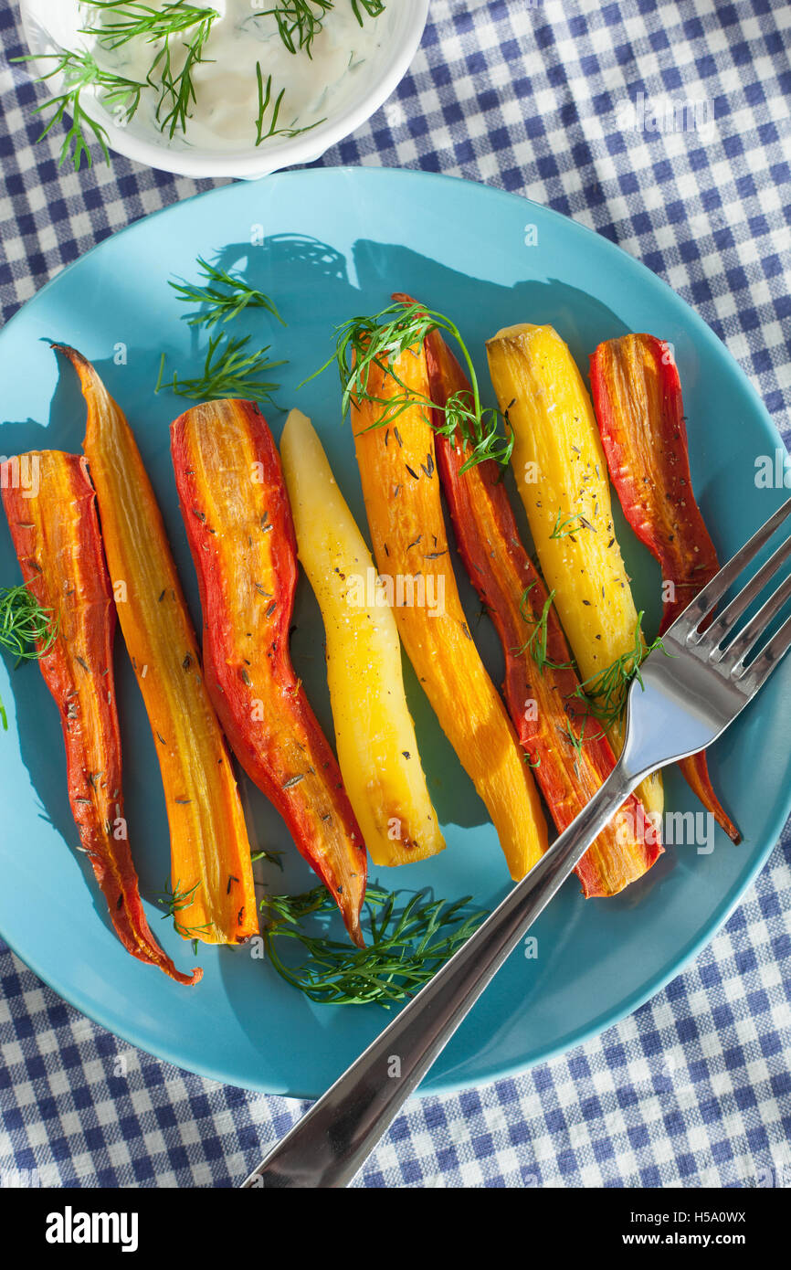 roasted colorful carrots on plate Stock Photo - Alamy