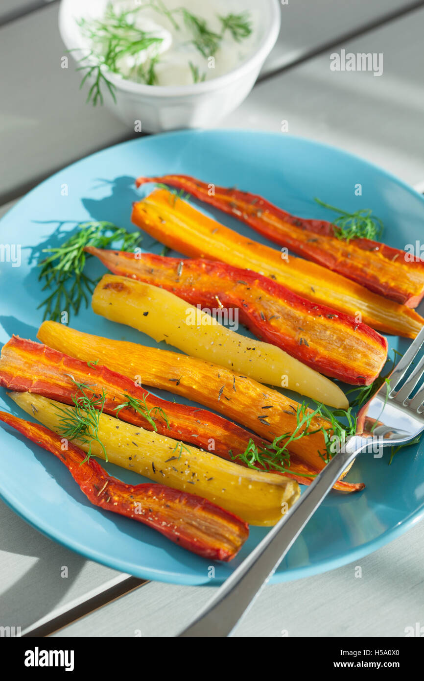roasted colorful carrots on plate Stock Photo - Alamy