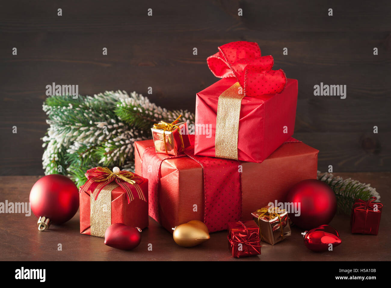 red and golden christmas gift box and decoration Stock Photo - Alamy