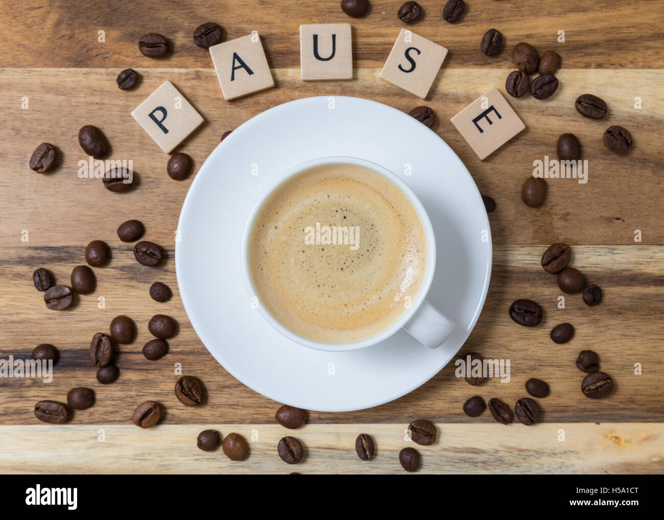Espresso Pause with coffee beans letter concept Stock Photo - Alamy