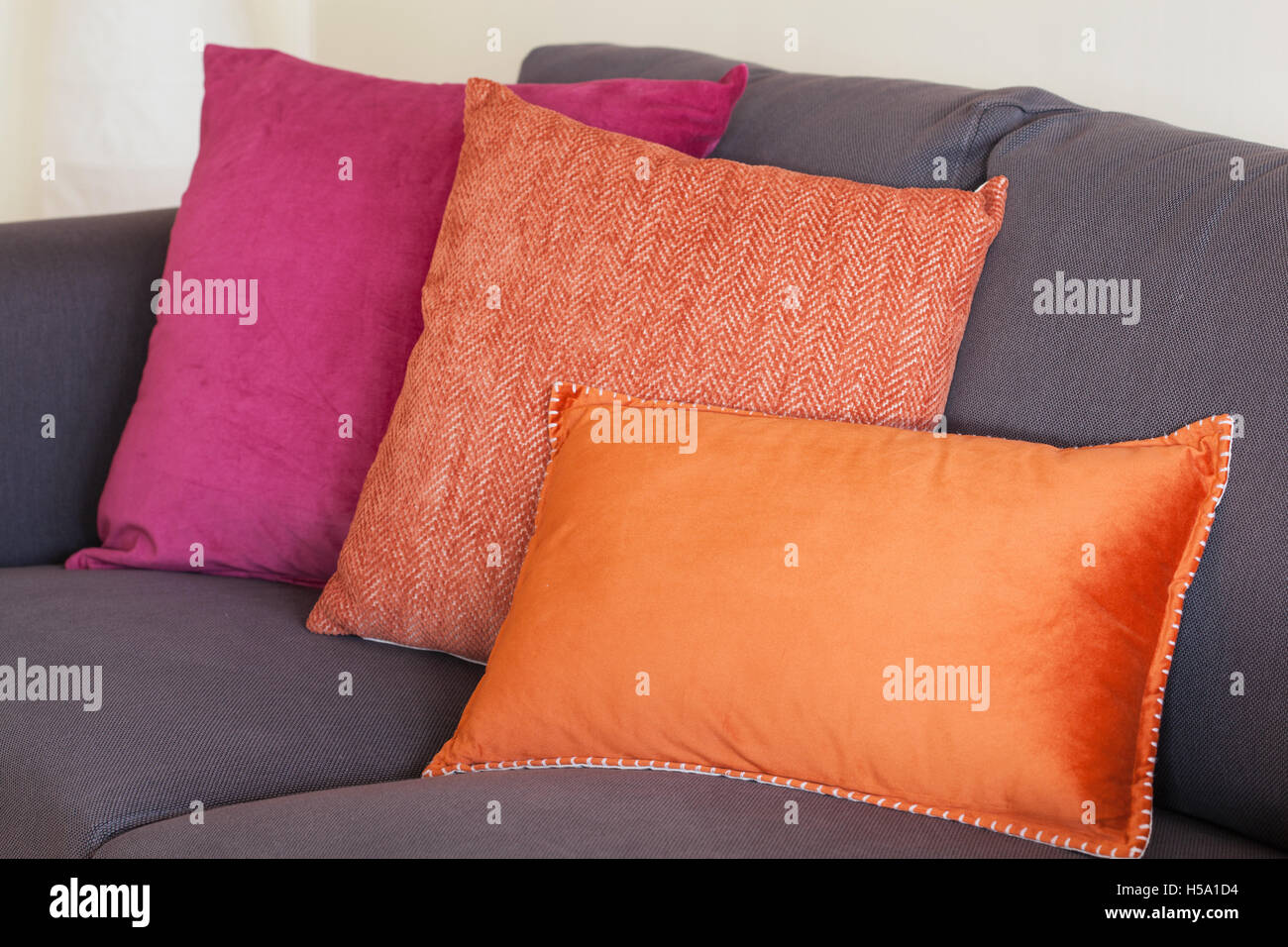 colorful cushion on sofa cozy home autumn Stock Photo - Alamy
