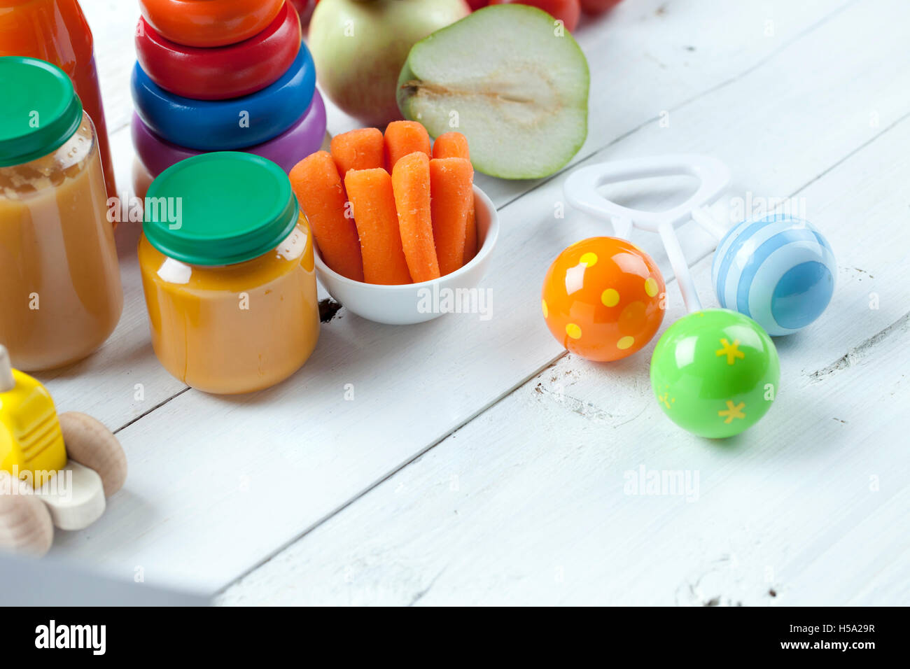 healthy ready-made baby food on a wooden table Stock Photo - Alamy