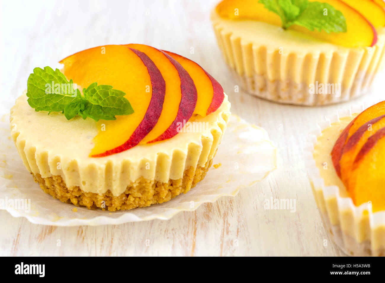 Mini Peach Cheesecake Stock Photo - Alamy