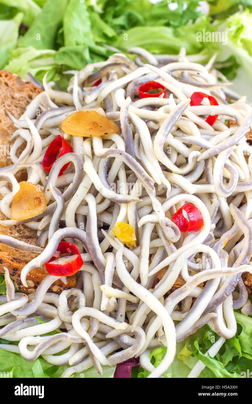 Angulas Cooking Angulas: Baby Glass Eels In Olive Oil