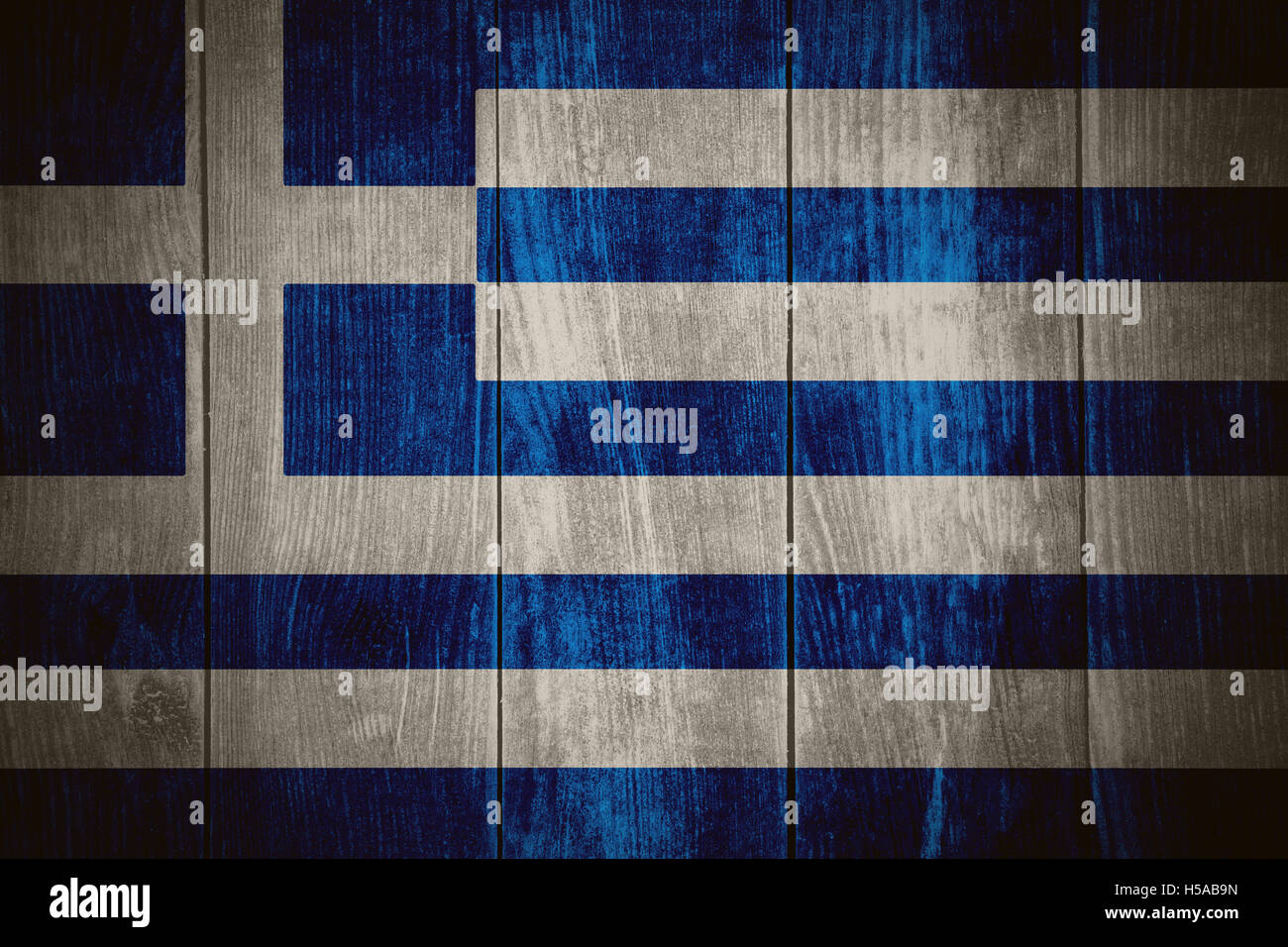 flag of Greece or Greek banner on wooden background Stock Photo - Alamy