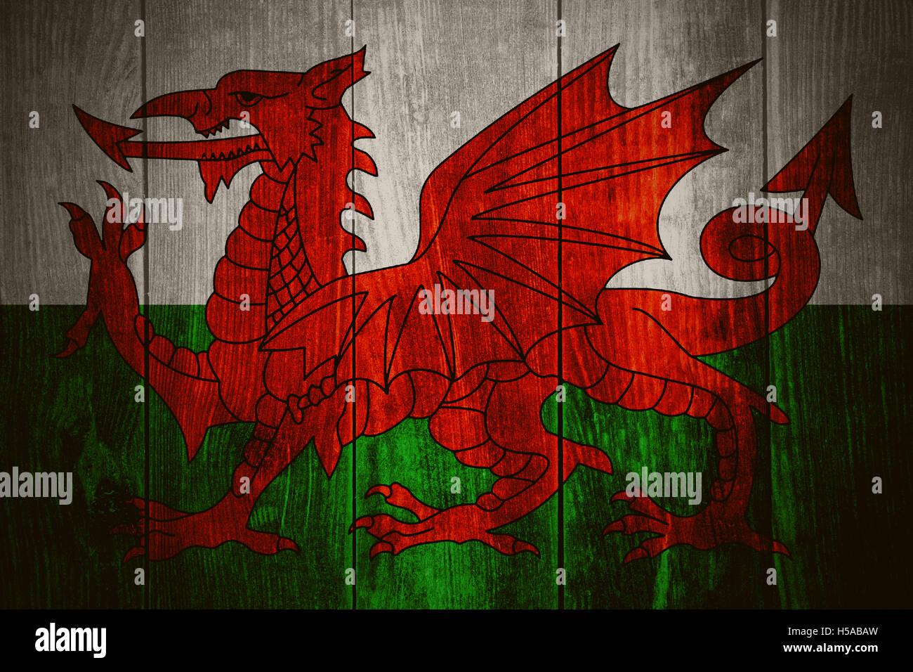 flag of Wales or Welsh banner on wooden background Stock Photo - Alamy