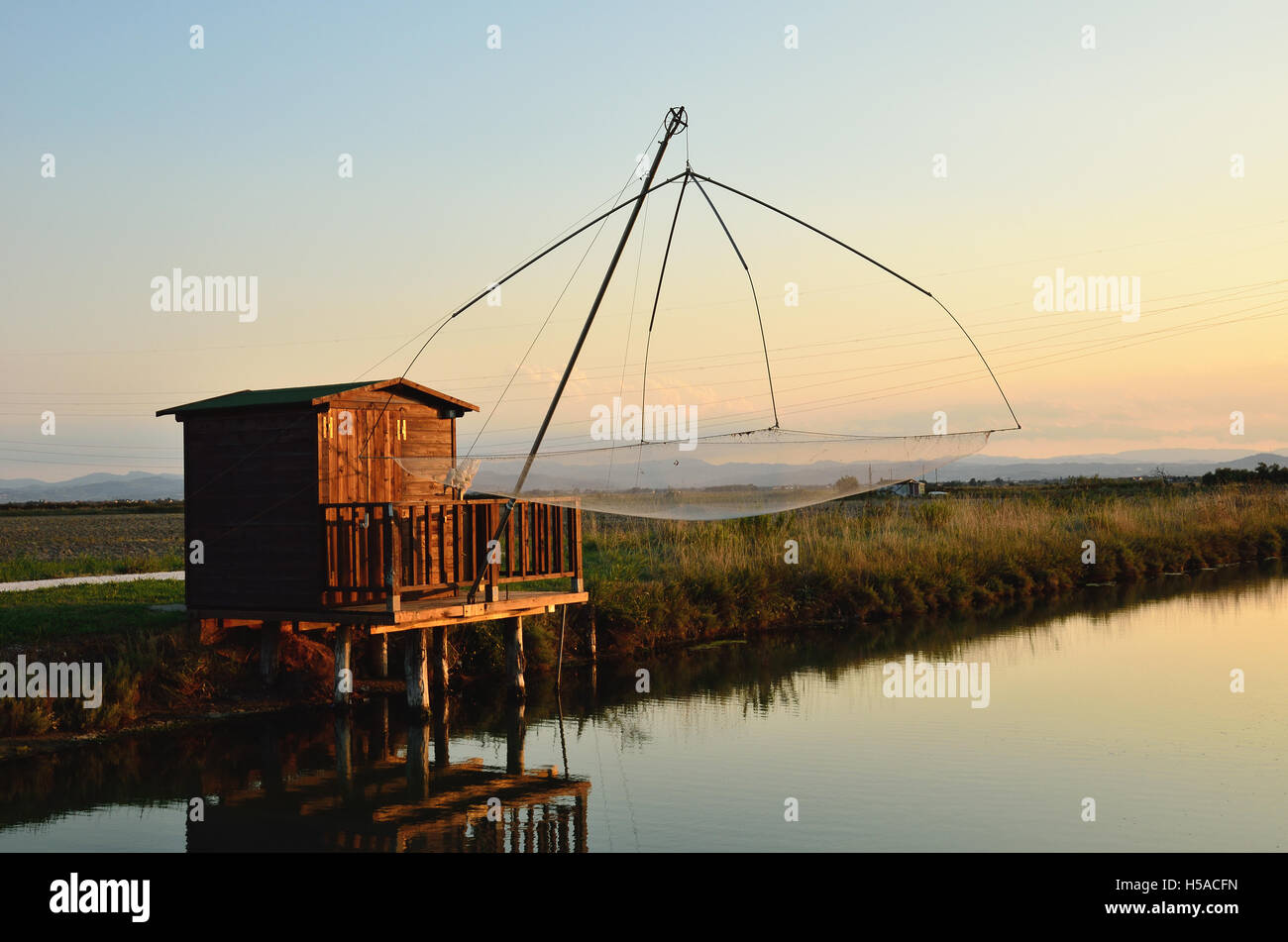 fishing houses at sunset in cervia, rimini. italy Stock Photo - Alamy