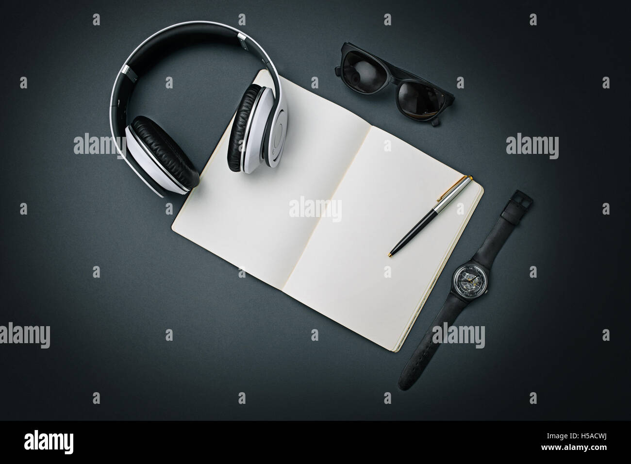 Still life of casual man. Modern male accessories on black Stock Photo ...