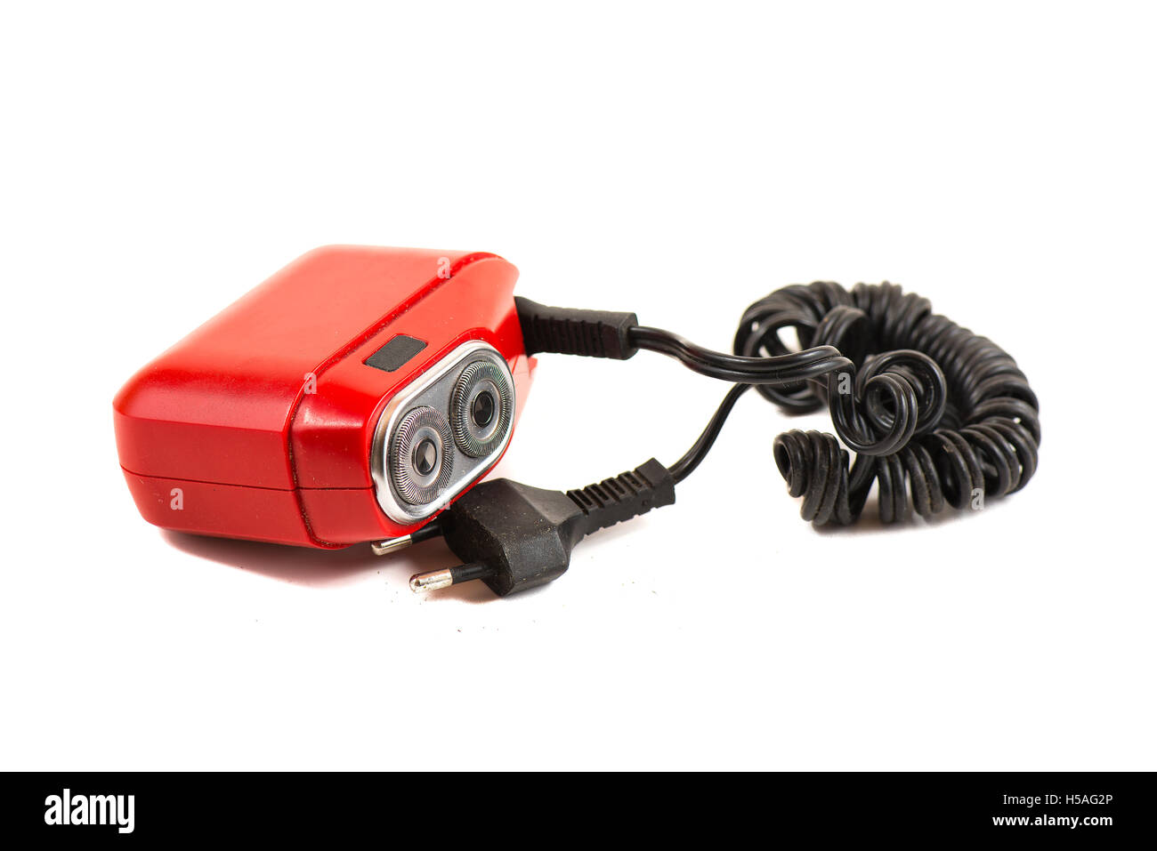 Red vintage electric shaver razor on white background Stock Photo - Alamy