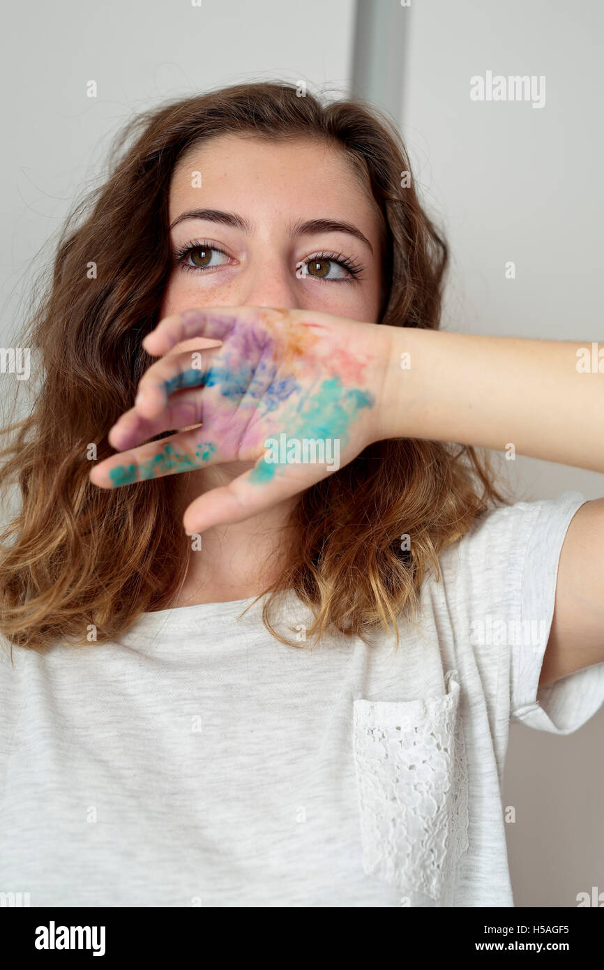 A teenager who will cover part of the face with a hand painted ...