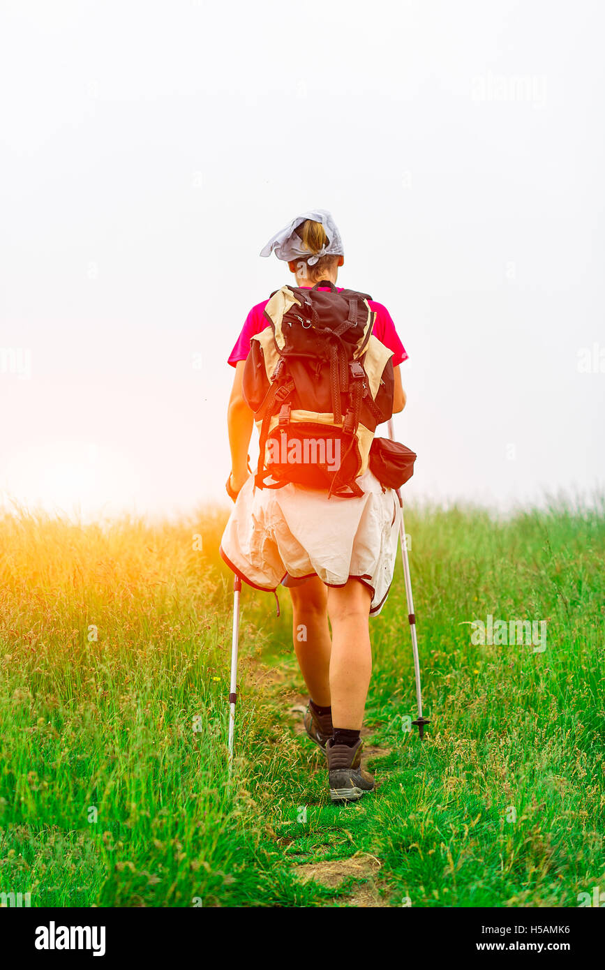 Woman hiker meadow sun Stock Photo - Alamy