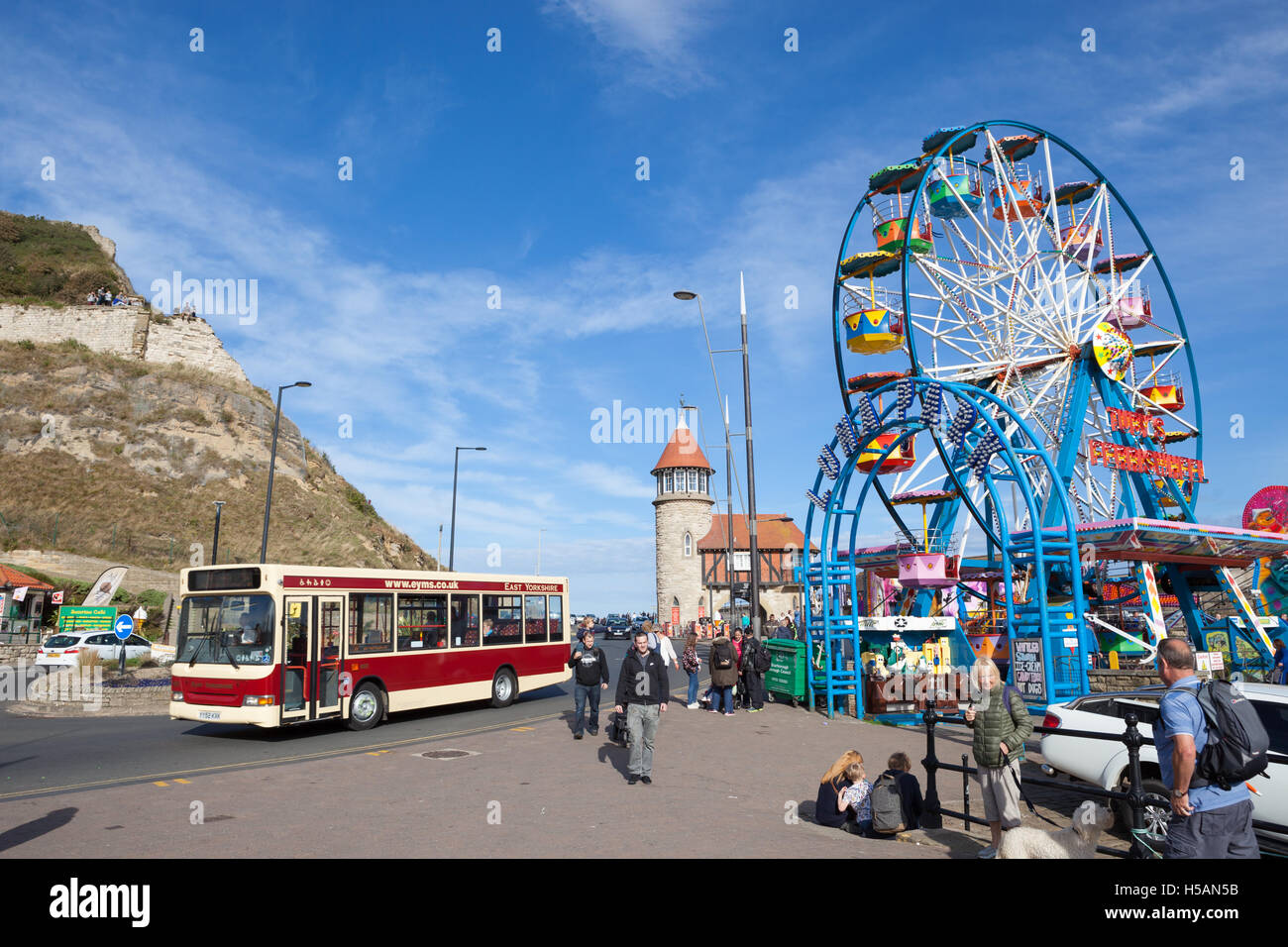 People and the entrance to Luna Park, a small fairground in Scarborough ...